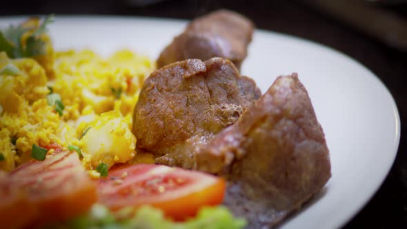 Ecuadorian Fritada with mote pillo and salad, Stock Footage | VideoHive