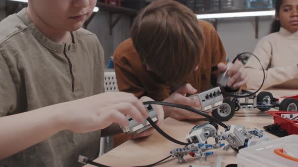 Modern Boys Building Robotic Models, Stock Footage | VideoHive