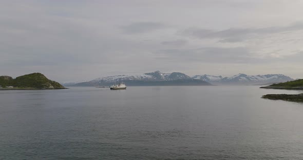 Ferry to Senja island on calm fjord in extremely scenic arctic area ...