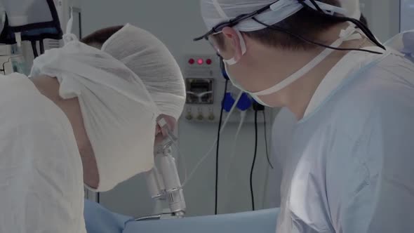 Surgeons Look at the Patient's Testicles During the Operation, Stock ...