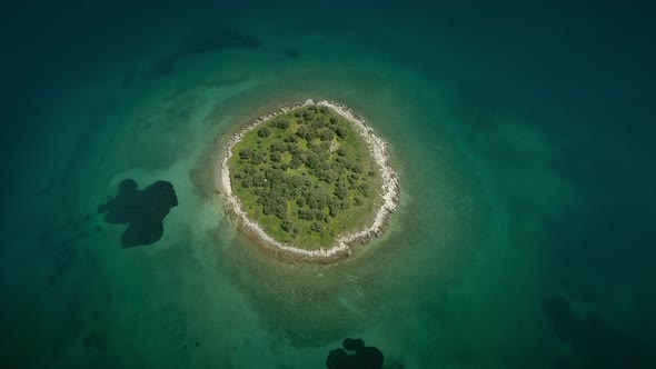 Aerial view of the St. Athanasios island in the Gulf of Corinth, Greece ...