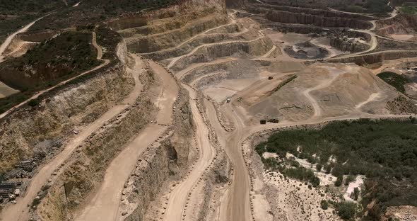 Stone sorting station in a large Quarry, with rocks transported on ...