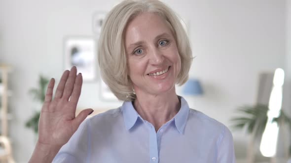 Hello, Old Woman Waving Hand to Welcome, Stock Footage | VideoHive