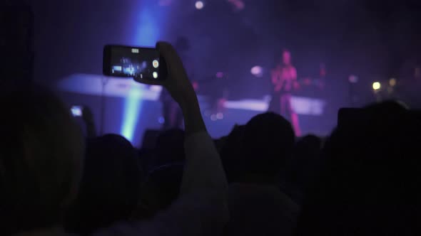 People Use Smart Phones Record Video at Music Concert Event Girl Singer ...