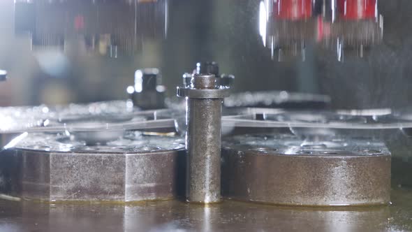 A large industrial punch press forming sheet metal parts, Stock Footage