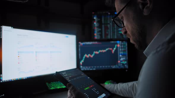 Trader Holds Tablet Analyzes the Stock Market, Stock Footage | VideoHive