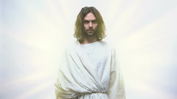 Good Jesus Looking Into Camera in Shining Gracious Light, Resurrection ...