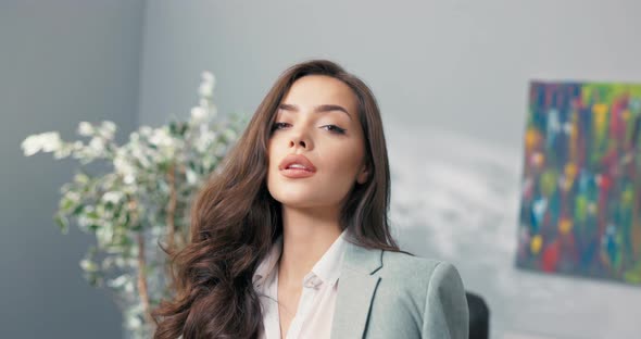 Smiling Cheerful Secretary Manager Boss is Sitting Leaning Against the ...