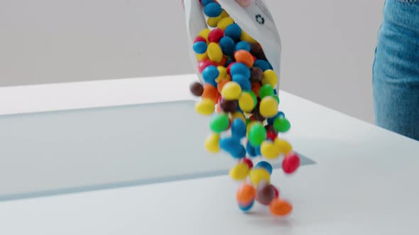 Multiple Colourful Candy Being Dropped on Table, Stock Footage | VideoHive