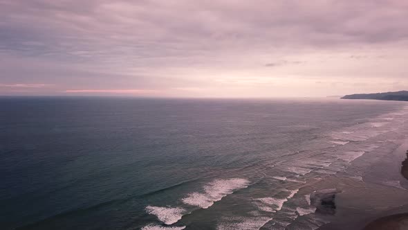 Beautiful purple colors over Olon Beach in Ecuador -aerial, Stock Footage