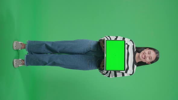 Full Body Woman Holding Green Screen Computer While Standing On Green ...