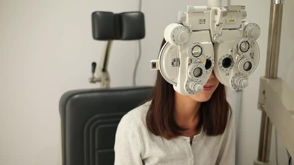 Patient with head in medical device for examining for eye sight , Stock ...