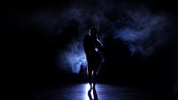 Dancing Girl Samba in Studio, Silhouette. Blue Backlight, Stock Footage