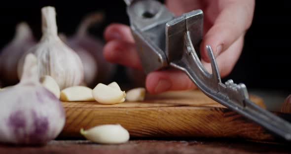 Men Hands Put a Garlic Masher., Stock Footage | VideoHive