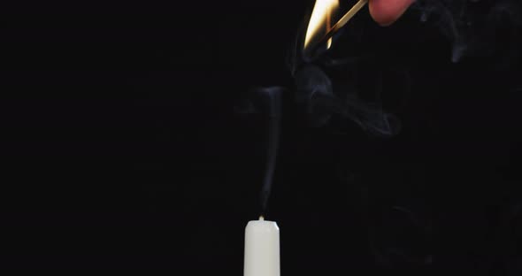 Candle being turned off and fired again, Stock Footage | VideoHive