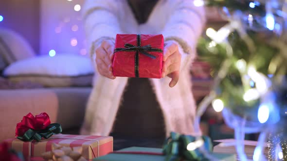 asian female hand present sending present gift box red color, Stock Footage