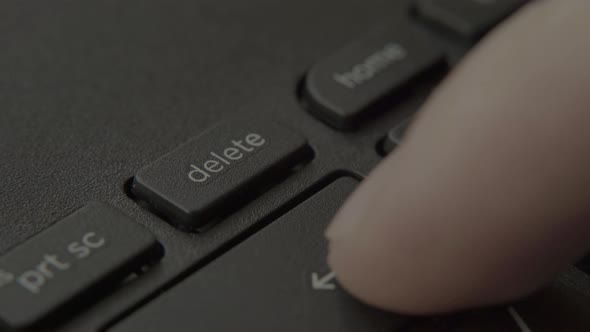 Finger Presses Delete Button on Keyboard, Stock Footage | VideoHive