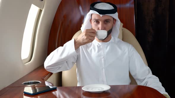 Arabian man flying on his Private jet to dubai., Stock Footage | VideoHive