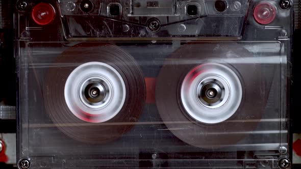 vintage audio cassette fast forwarding and then playback in tape deck ...