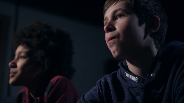 Closeup Laughing, Chewing Cute Boy Watching Comedy, Stock Footage ...