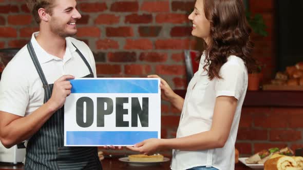 Waiter and Customer Holding a Board with Open Sign, Stock Footage ...