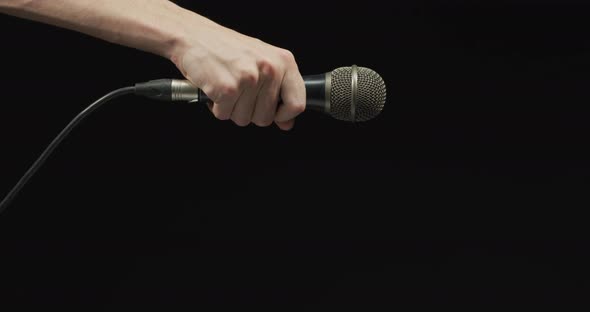 Hand dropping the microphone, Stock Footage | VideoHive