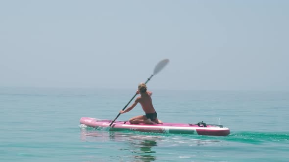 Kid on Paddle Board, Stock Footage | VideoHive