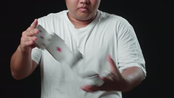 Man Showing Card Spring, Cardistry On Black Background, Stock Footage