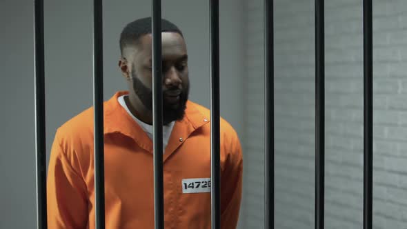 Jail Guard Giving African-American Prisoner Packet With Pills, Illegal ...