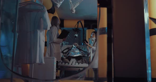 Beautiful Female Scientists Conduct a Scientific Experiment on an Alien ...