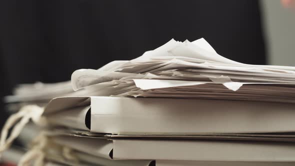 Stacking Folders with Documents in a Stack with Hands Counting Files ...