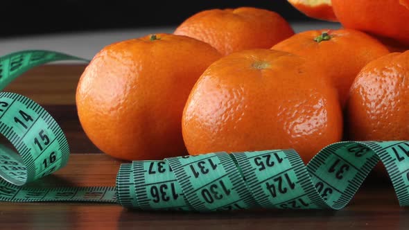 Mandarin And Tape Measure Turning , Stock Footage | VideoHive