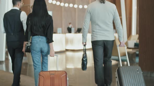 Concierge Escorting Guests to Reception Desk, Stock Footage | VideoHive