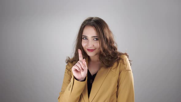 Portrait of Smiling Woman Showing No Sign By Index Finger Standing on a ...