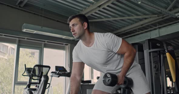 Athlete Picking Up Dumbbell at Gym, Training Arm Muscles, Slow Motion ...