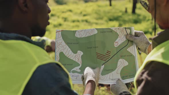 Geographers Holding Map of Area, Stock Footage | VideoHive
