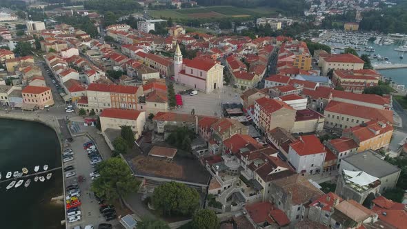 Aerial view of Porec, Parenzo main square and church at evening, Stock ...