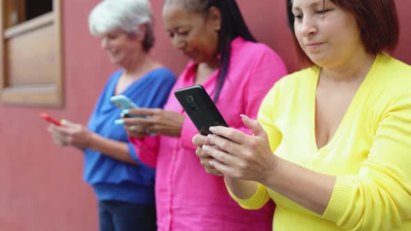 Multiracial Senior People Having Fun Using Mobile Phones Outdoor ...