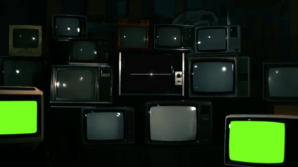 Three Stacked Retro Televisions Turning Off Green Chroma Key Screens ...