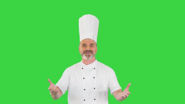 Chef Explaining Something To Camera While Walking on a Green Screen ...