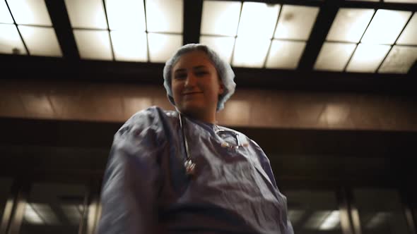 Dancing Young Female Surgeon Takes Off Medical Mask During Night Shift ...