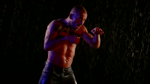 Professional Boxer or Kickboxer is Fighting with Imaginary Enemy in ...
