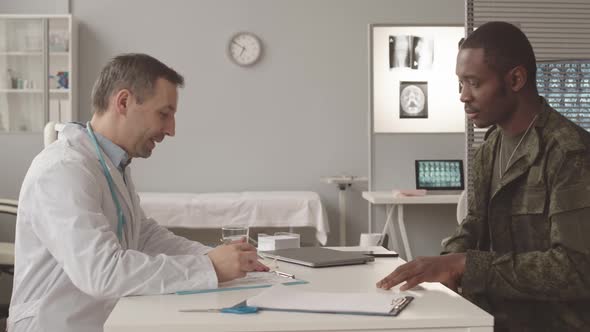 Military Officer Visiting Radiologist at Clinic, Stock Footage | VideoHive