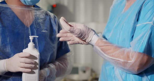 Close Up of Nurse Holding Bottle with Antiseptic Gel for Surgeon, Stock ...
