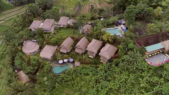 Aerial view of a small resort in the middle of a forest, Bali island ...