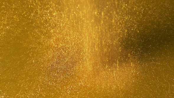 Sparkly Gold Powder Pours Onto Gold Surface, Stock Footage | VideoHive