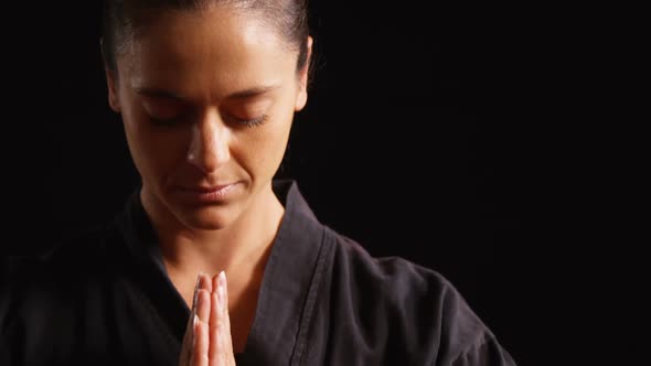 Karate player in prayer pose, Stock Footage | VideoHive