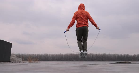 Young Man Skipping Rope Jumping Outdoor Back View, Stock Footage ...
