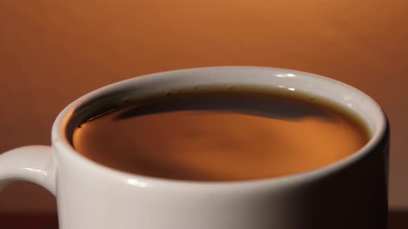Coffee Dropping Into Cup, Stock Footage | VideoHive