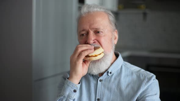 Closeup Portrait of Disgruntled Mature Adult Male Eating Unappetizing ...